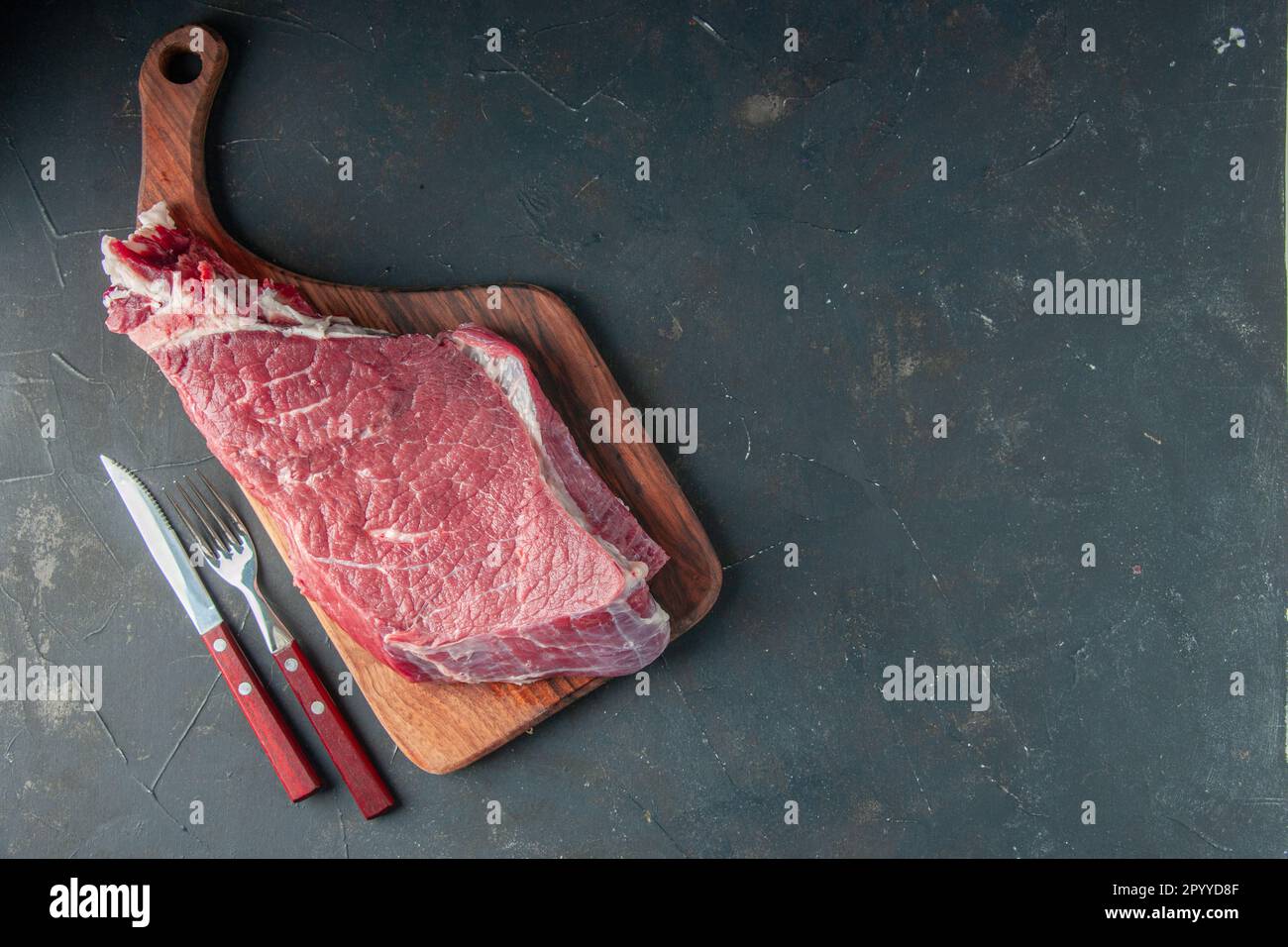 top view raw meat slice on dark background color butcher meal food meat ...