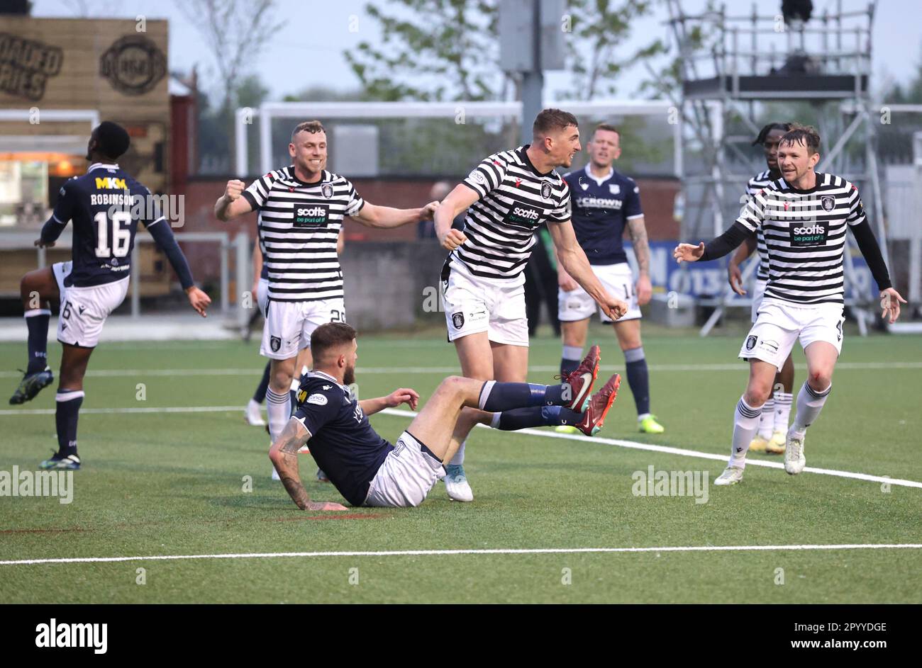 Queens Park's Charlie Fox (centre) celebrates scoring their side's ...