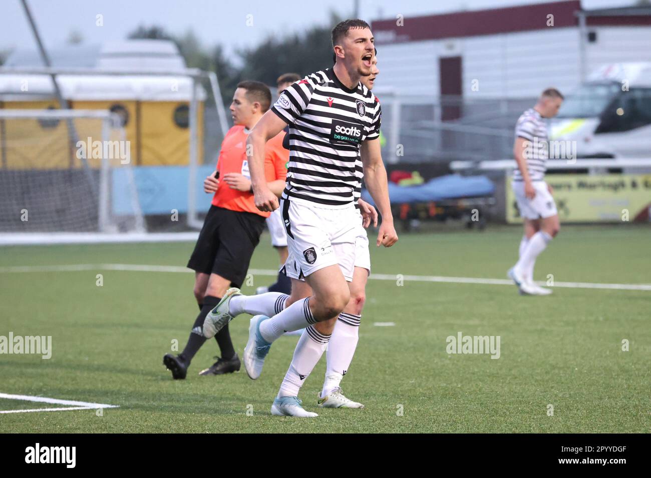 Queens Park's Charlie Fox celebrates scoring their side's third goal of ...