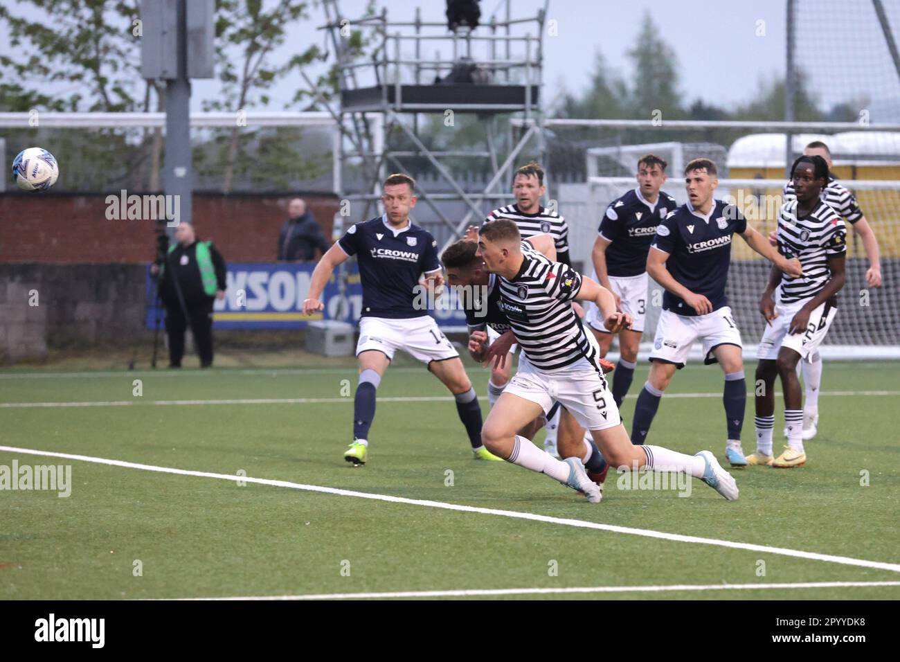 Queens Park's Charlie Fox (centre) scores their side's third goal of ...