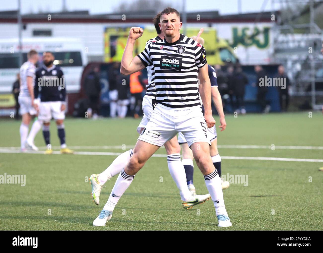 Queens Park's Charlie Fox celebrates scoring their side's third goal of ...
