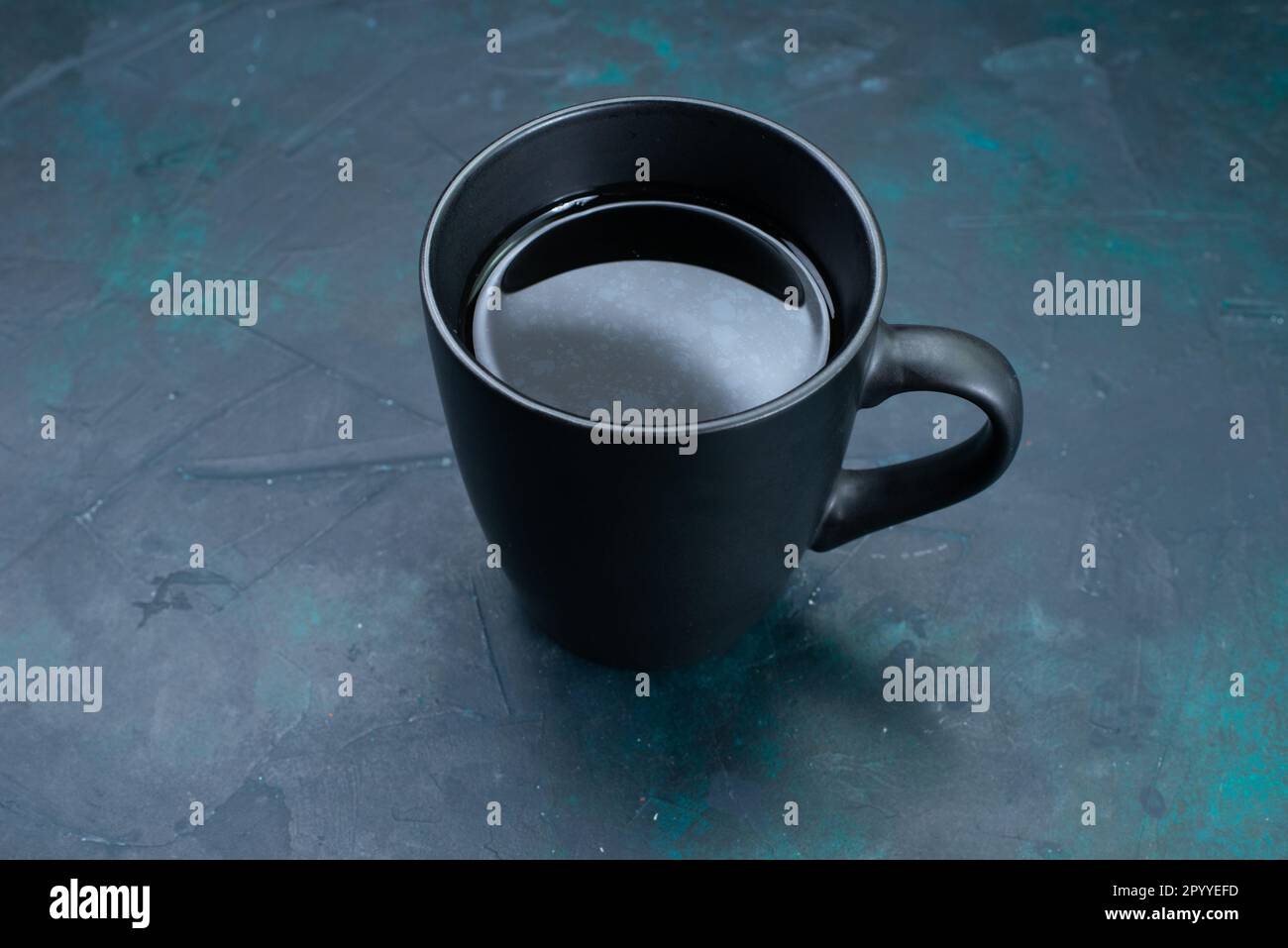 front view cup of tea on dark-blue desk tea drink color Stock Photo - Alamy