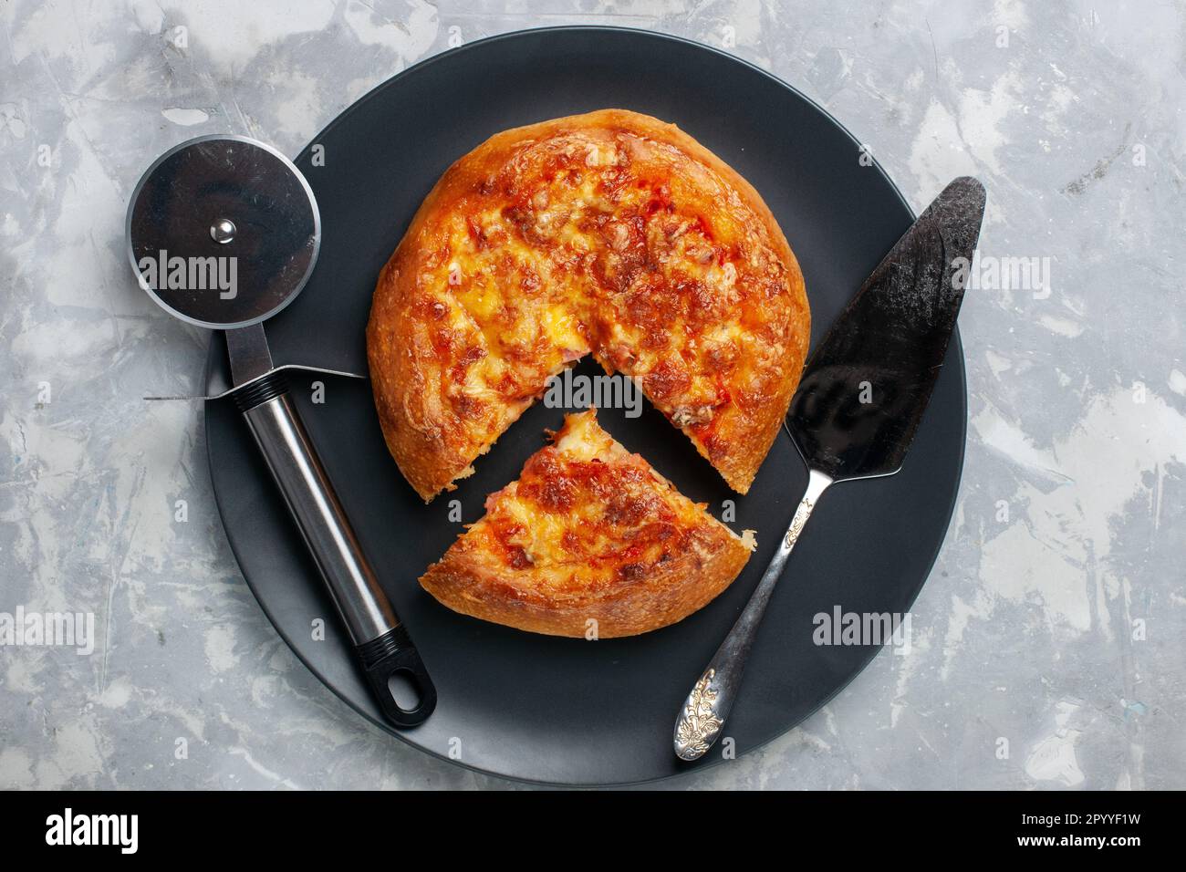 top view baked delicious pizza sliced inside plate on whtie background ...