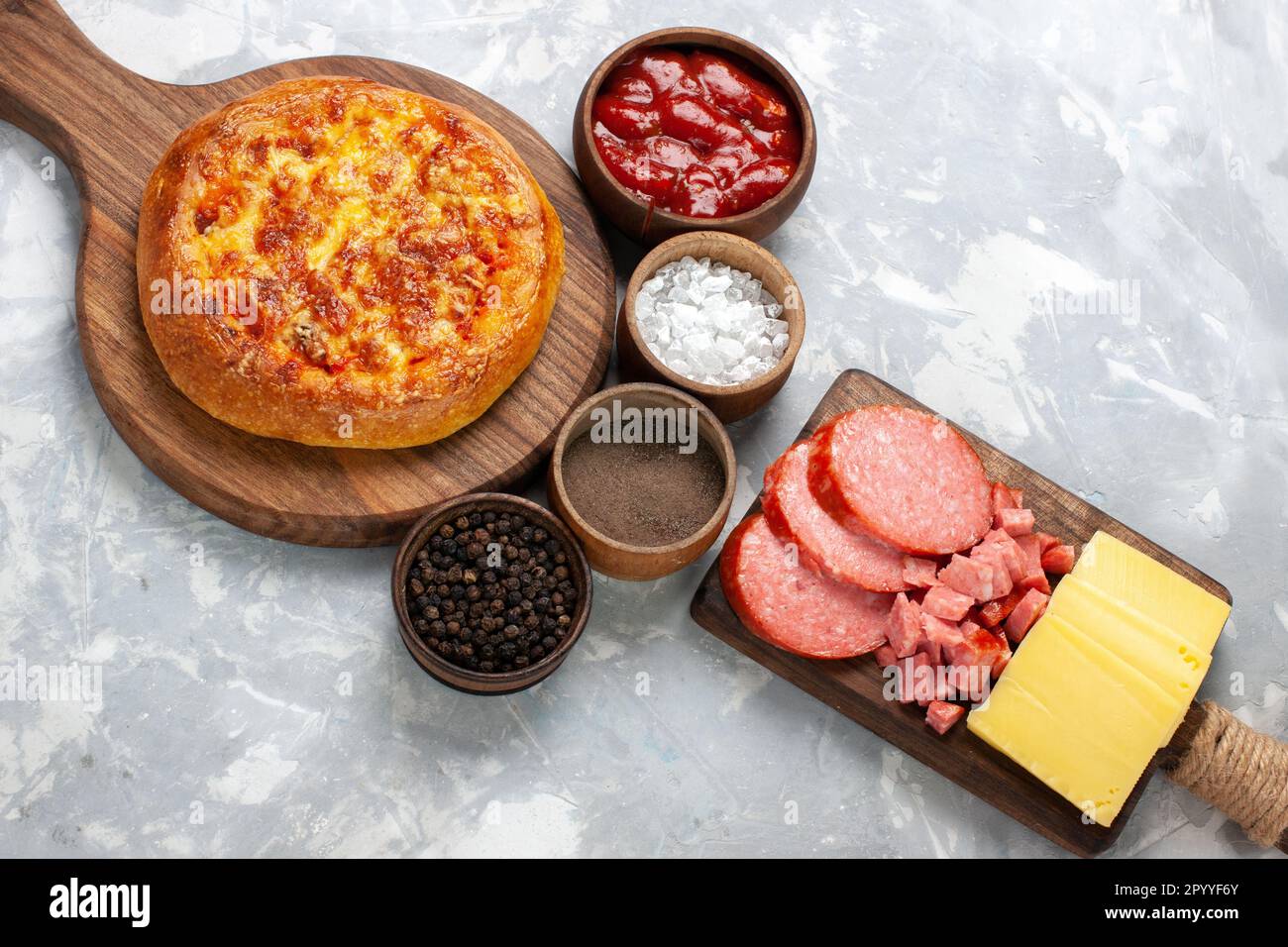 top view baked pizza with different seasonings on white desk meal pizza ...