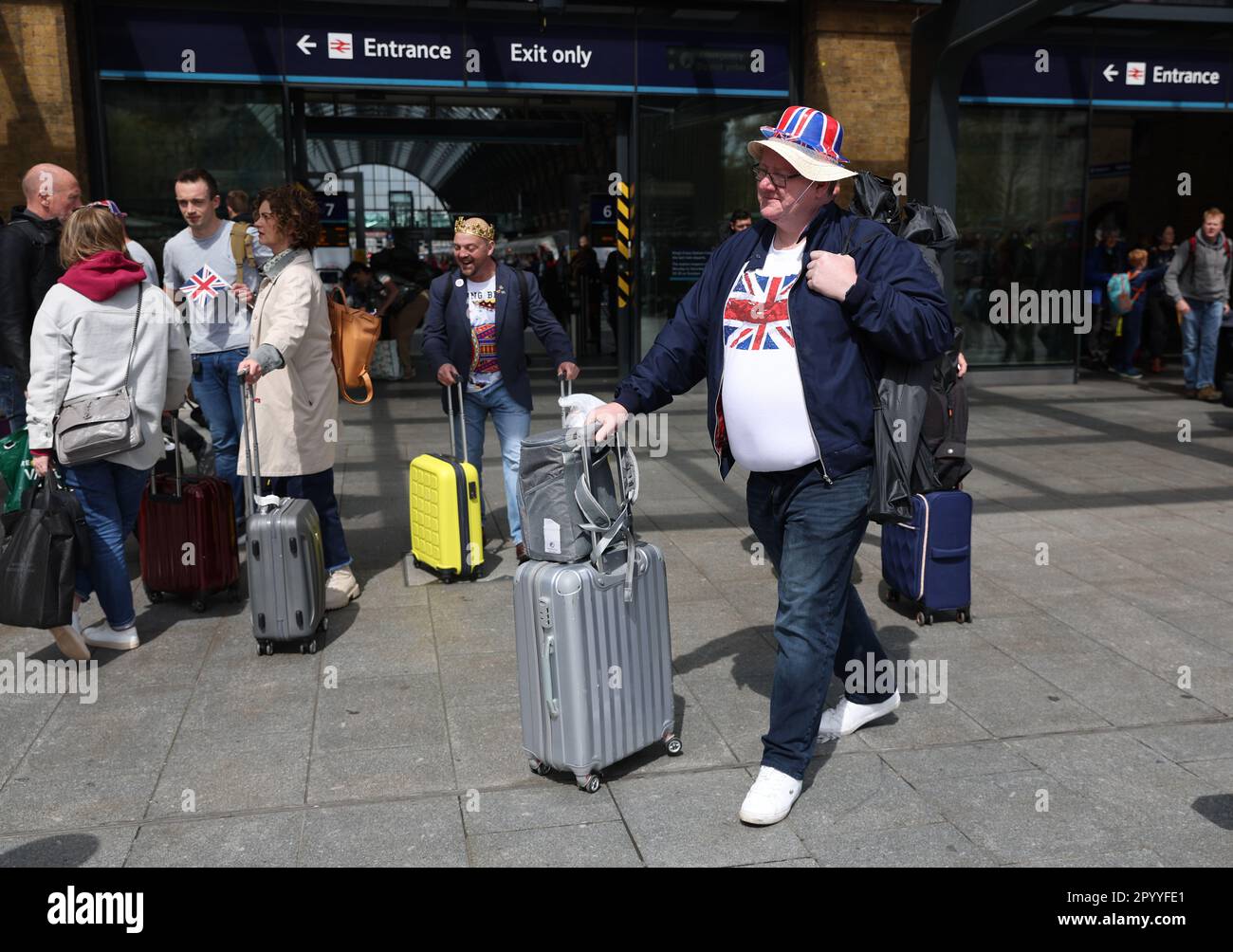 London, UK. 5 May, 2023. Royal fans arriving at Kings Cross rail ...