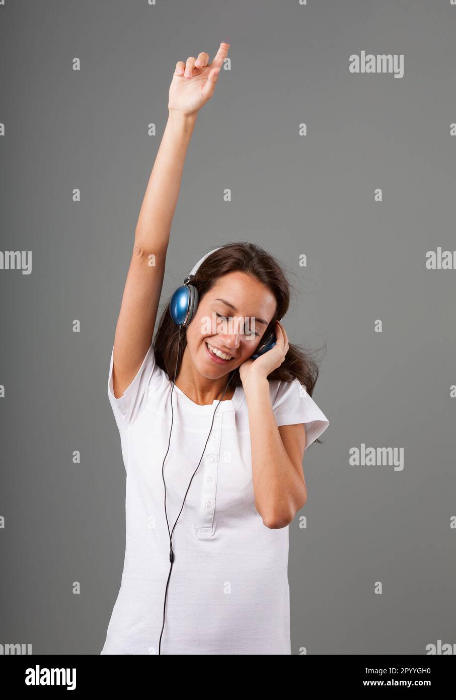 Emotional portrait of a young woman isolated on a neutral background ...