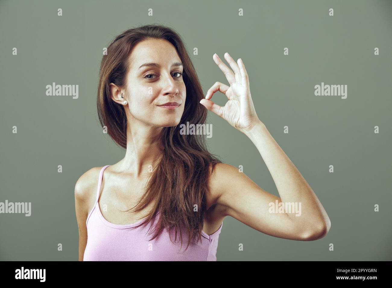 Perfect and delicious! Emotional portrait of young woman isolated on ...