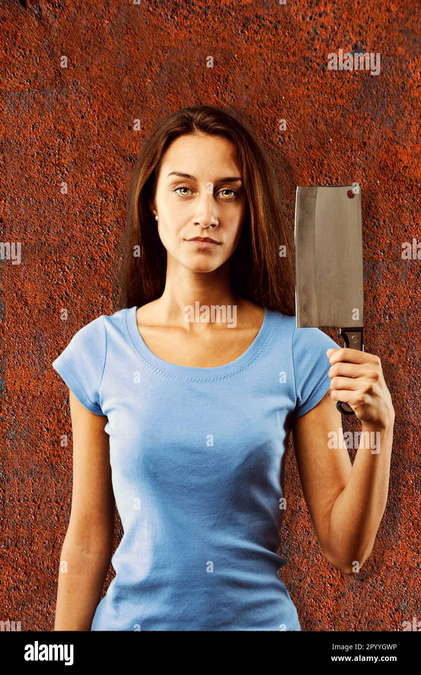 Emotional portrait of young woman isolated on rusty red background ...