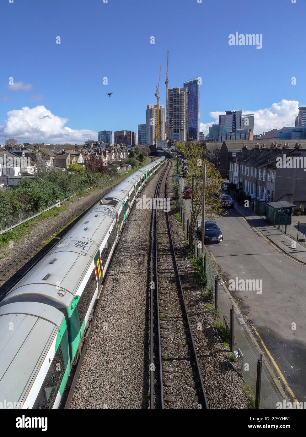 High view of Train, public transport, heading into central Croydon ...