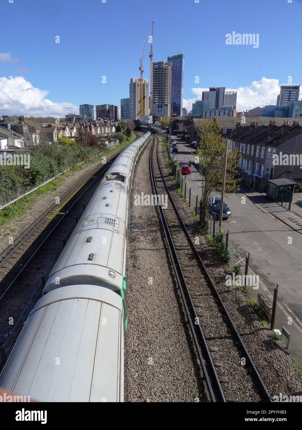 High view of Train, public transport, heading into central Croydon ...