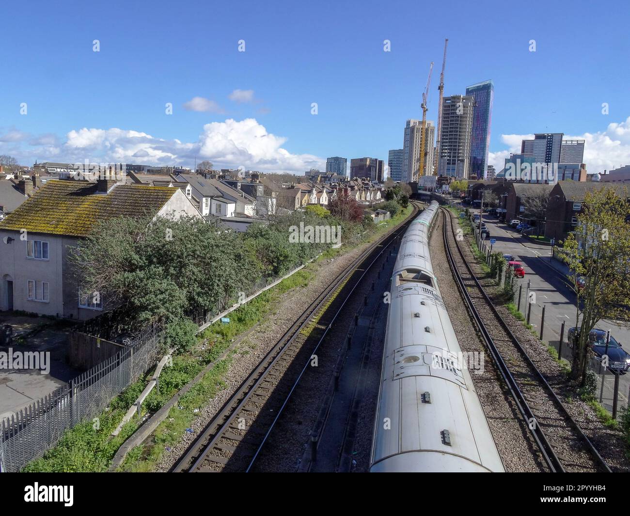 High view of Train, public transport, heading into central Croydon ...