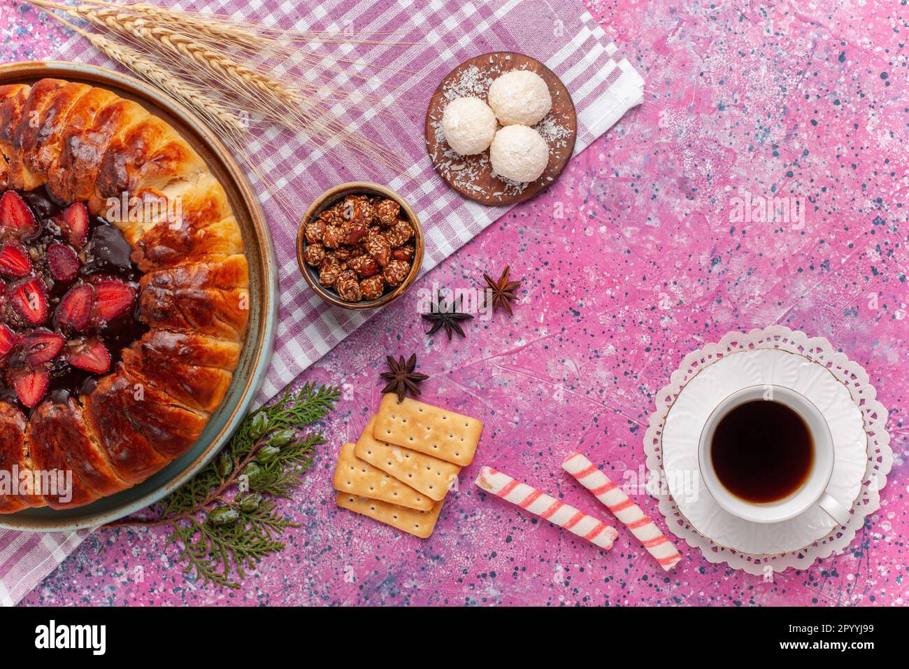 top view yummy strawberry pie fruity cake with tea on light pink ...