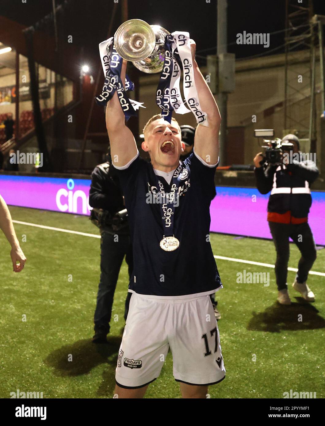 Dundee's Luke McCowan celebrates with the trophy after winning the ...