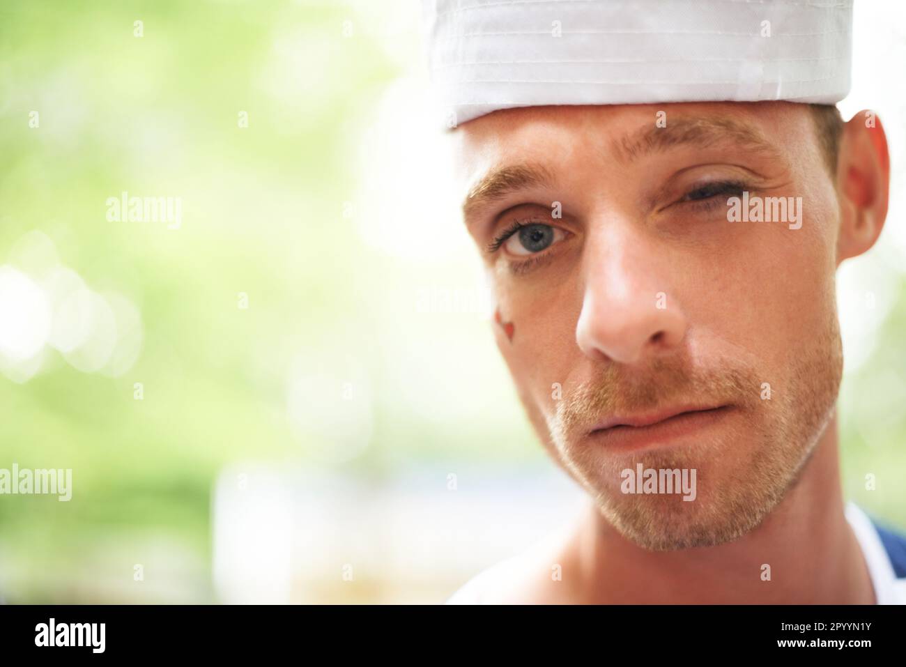 Handsome young man beard winking hi-res stock photography and images ...