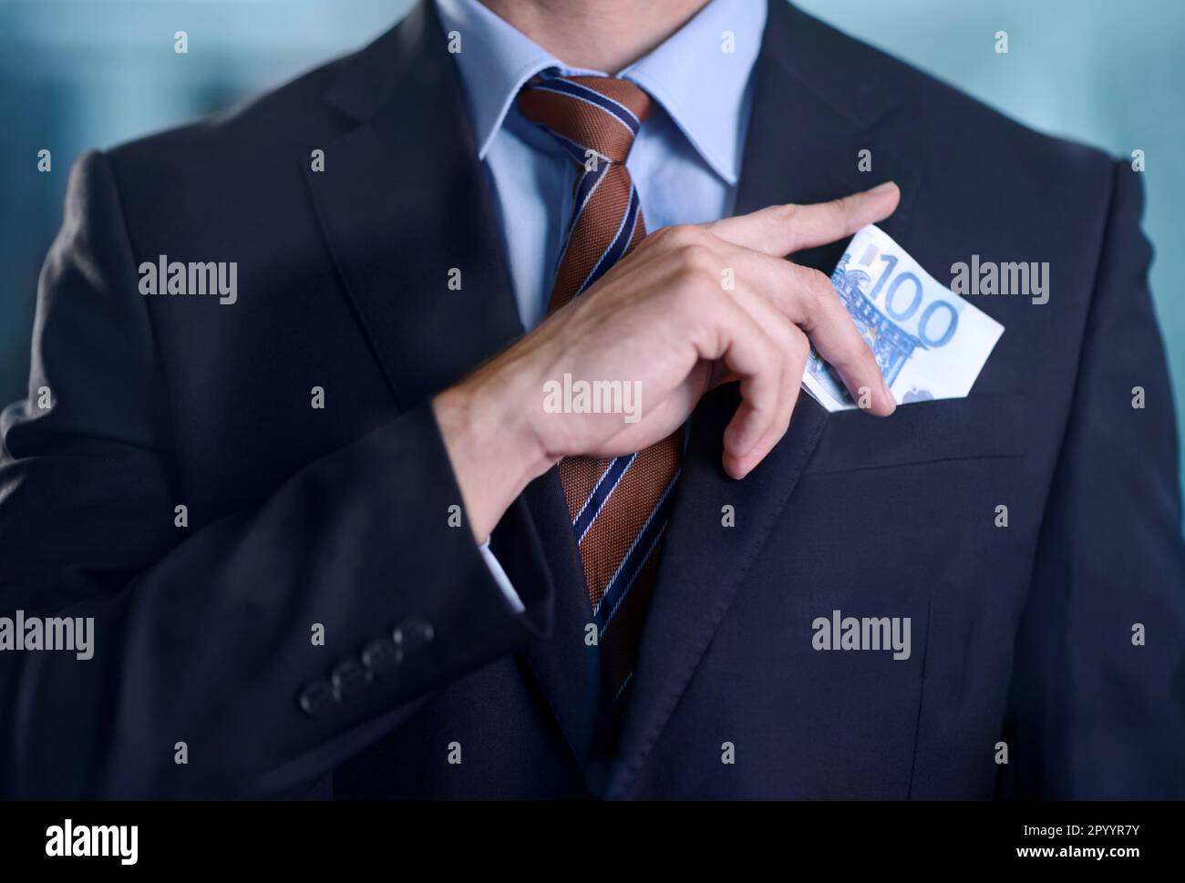 Businessman pocketing money hi-res stock photography and images - Alamy