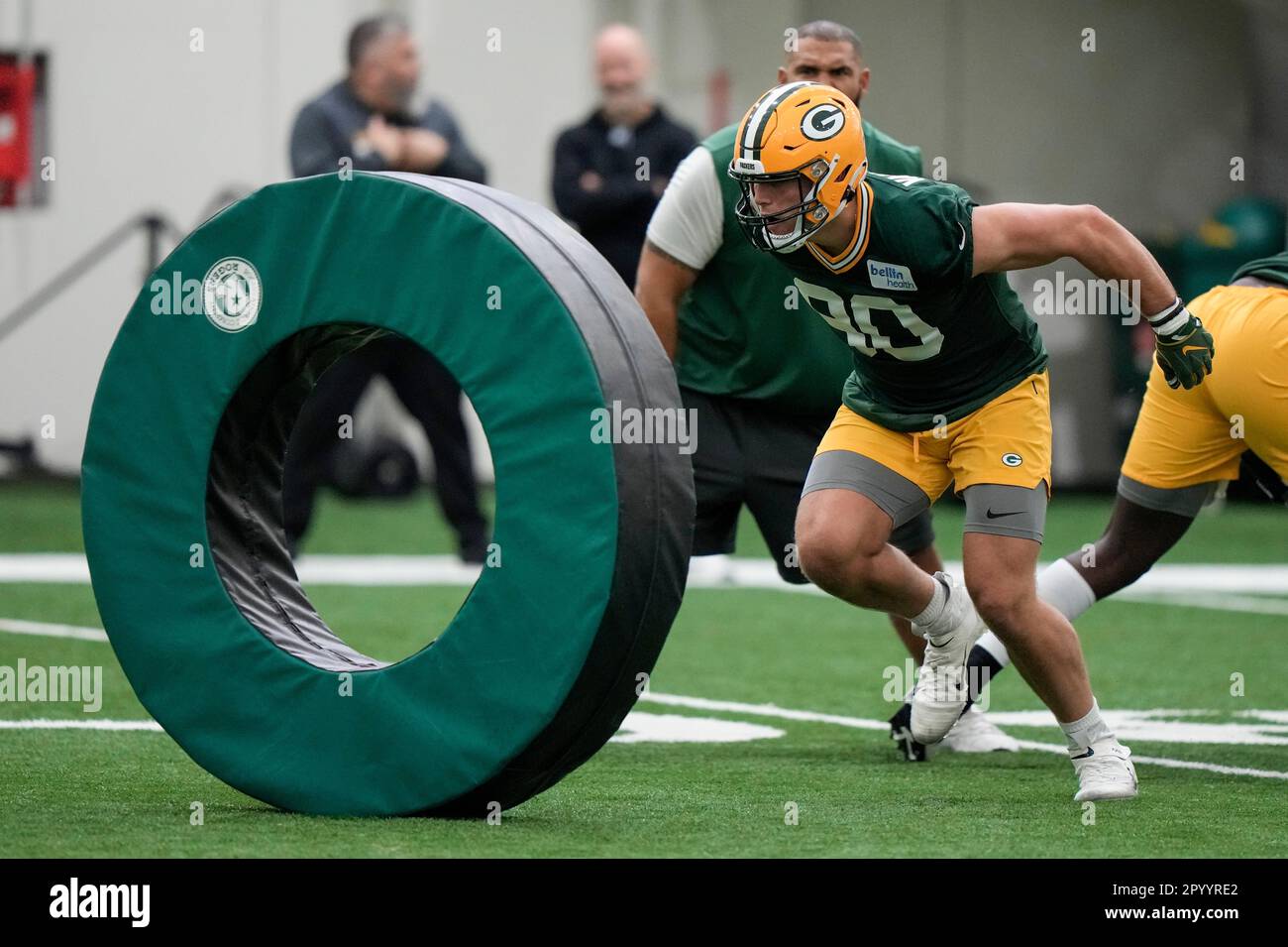 Green Bay Packers' Lukas Van Ness runs a drill during an NFL football ...