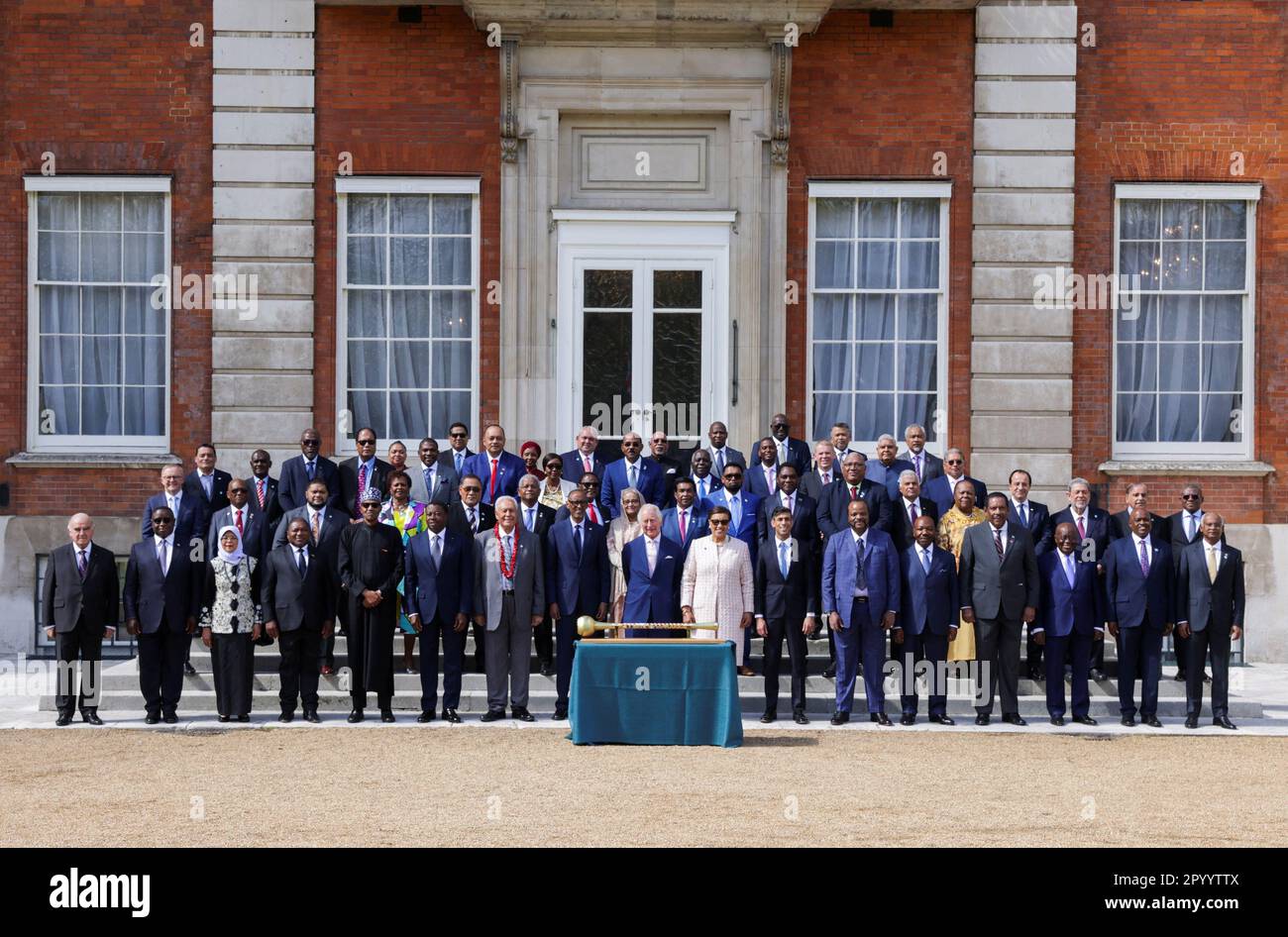 London, UK. 05th May, 2023. King Charles III (C) poses for a group photo with Commonwealth ...
