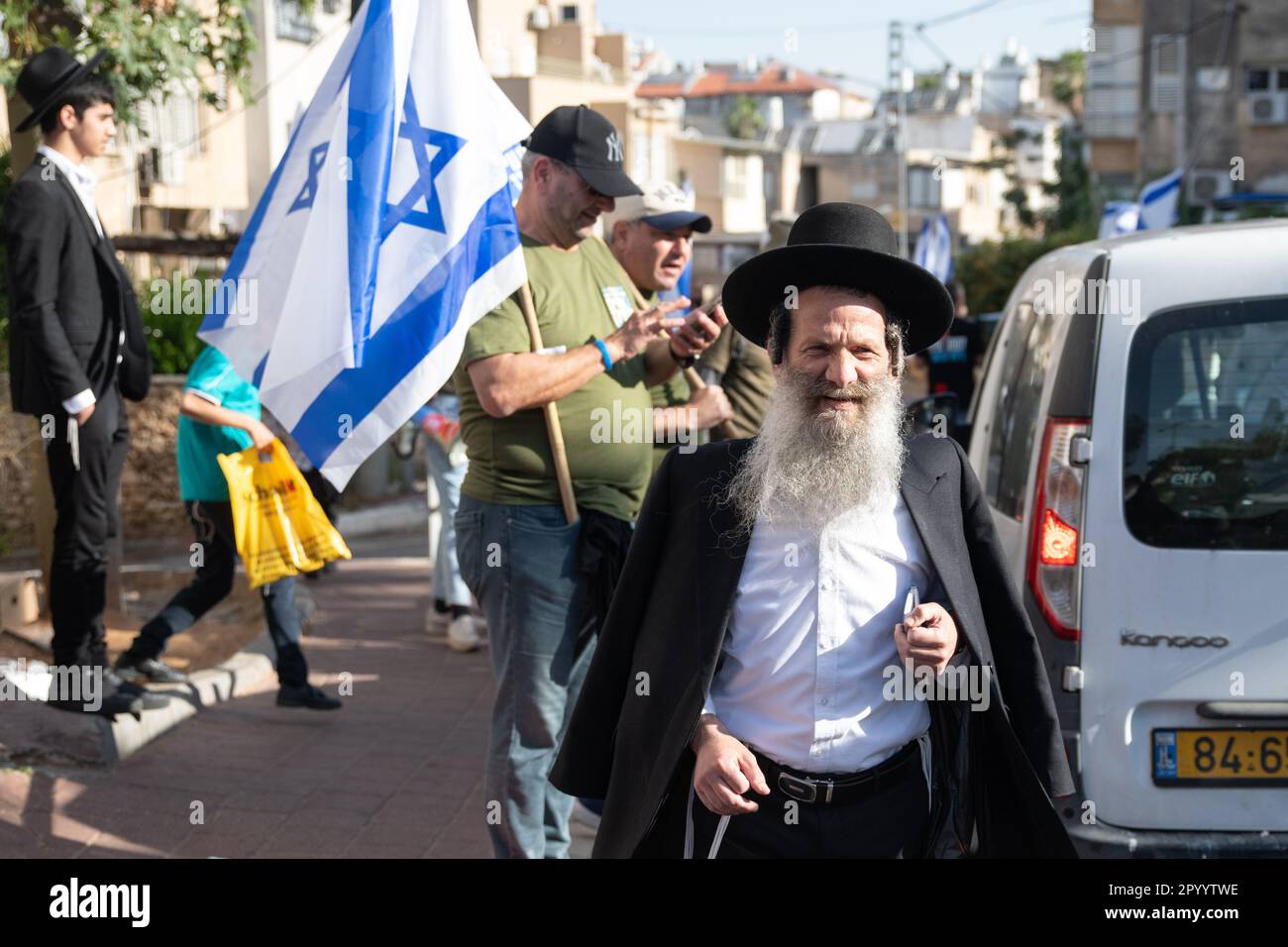 Bnei Brak, Israel. 04th May, 2023. An orthodox man passes by Israeli ...