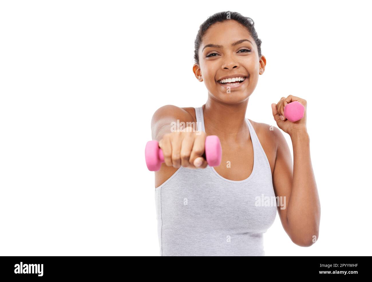 Feeling the burn and pushing through with a smile. A young woman ...