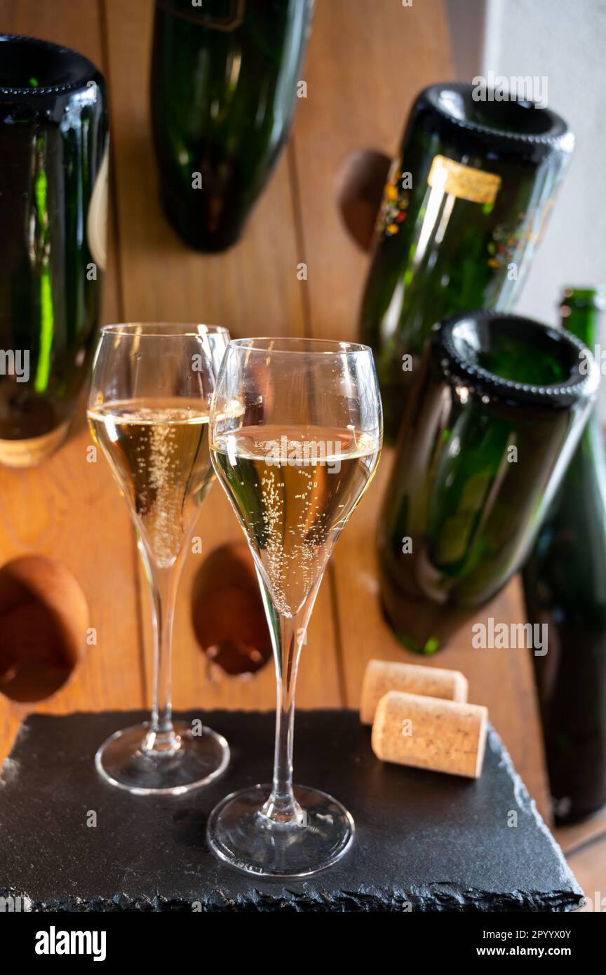 Glasses of sparkling white wine champagne gran cru or cava with bubbles ...