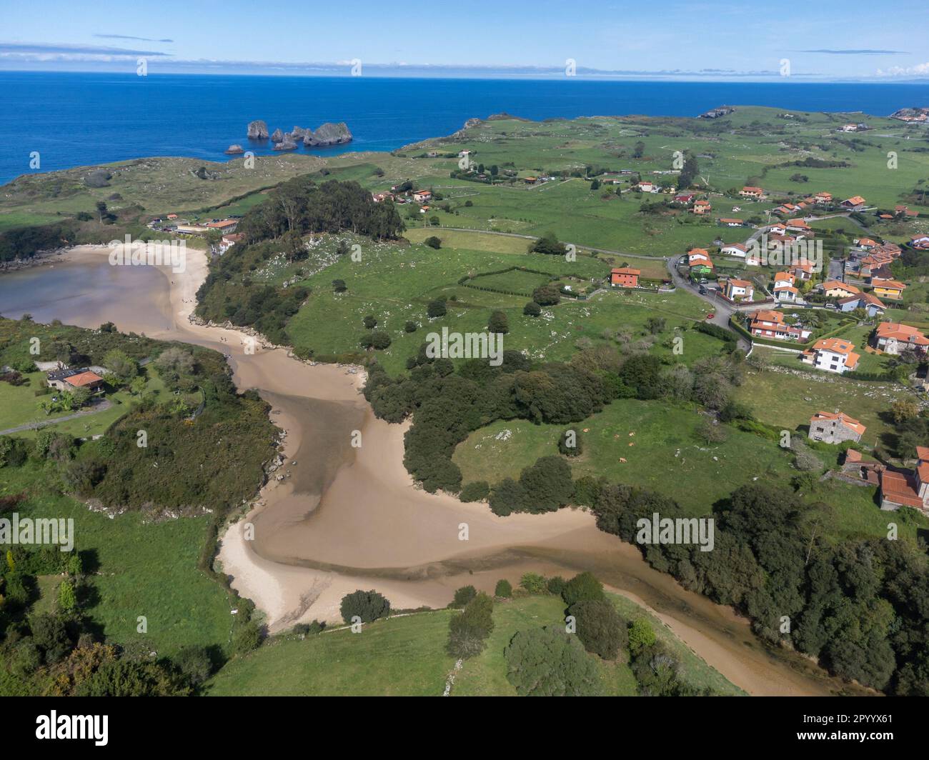 Aerial view on Playa de Poo during low tide near Llanes, Green coast of ...