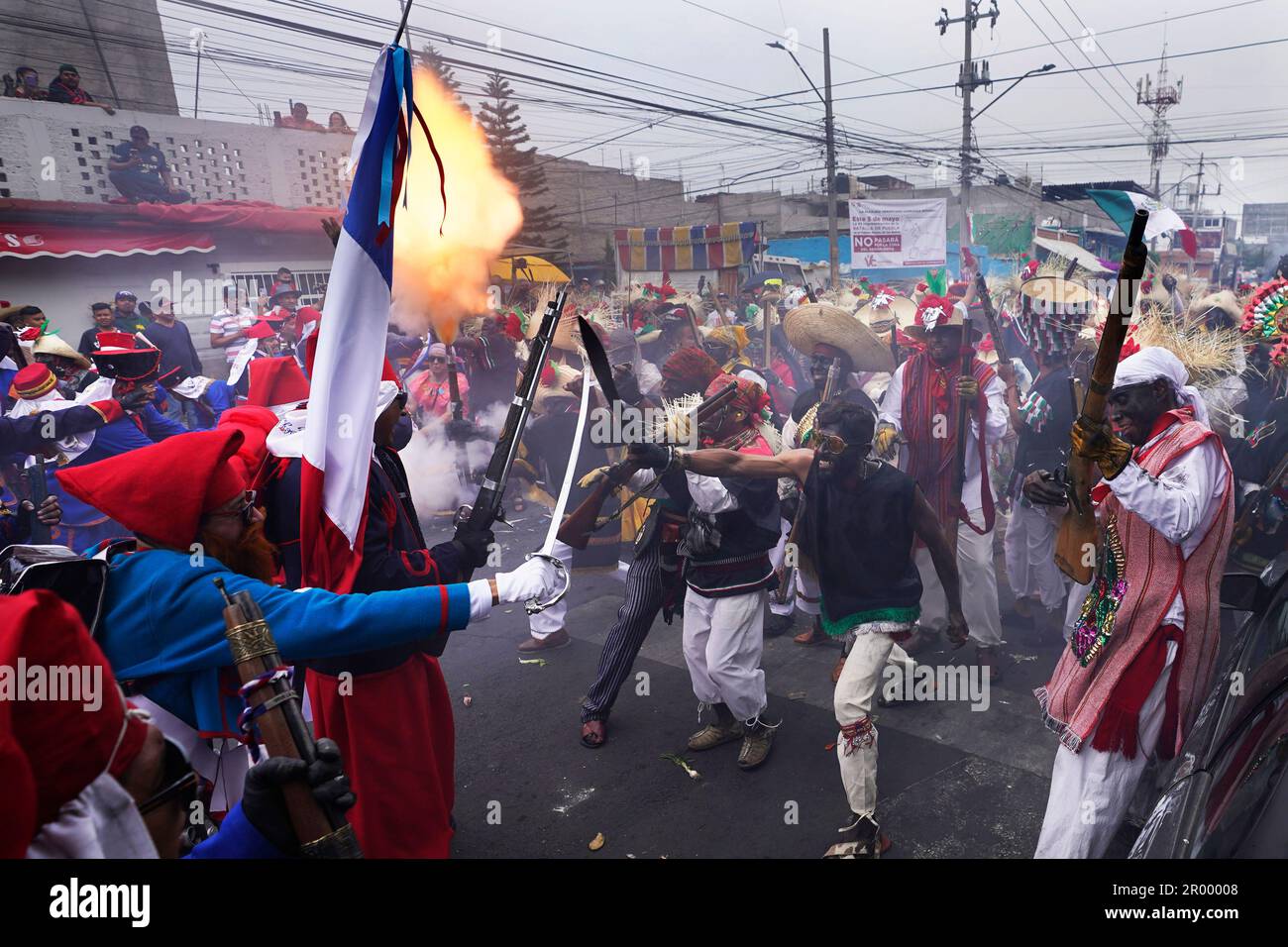 People take part in a reenactment of the Battle of Puebla during a ...