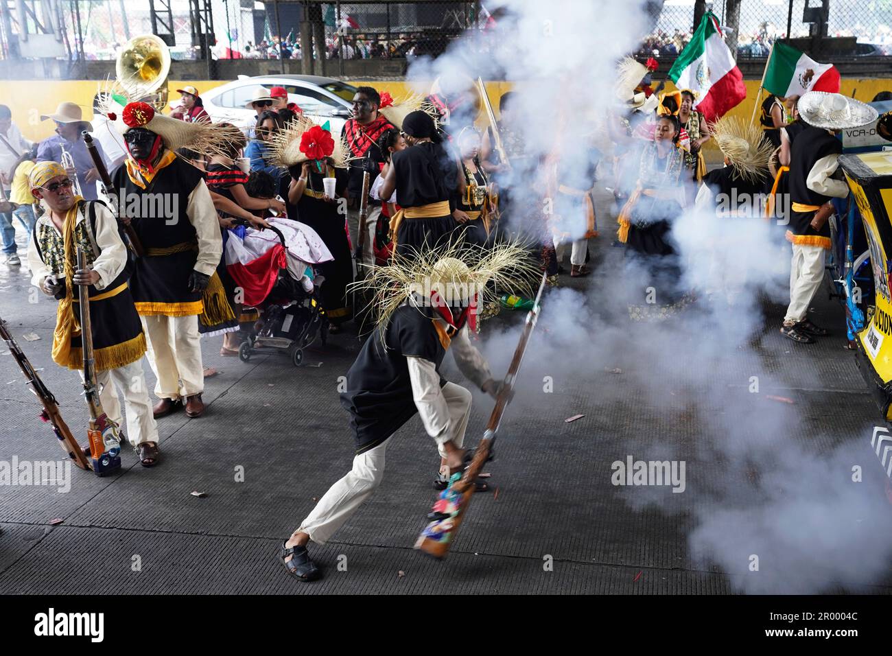 People take part in a reenactment of the Battle of Puebla during a ...
