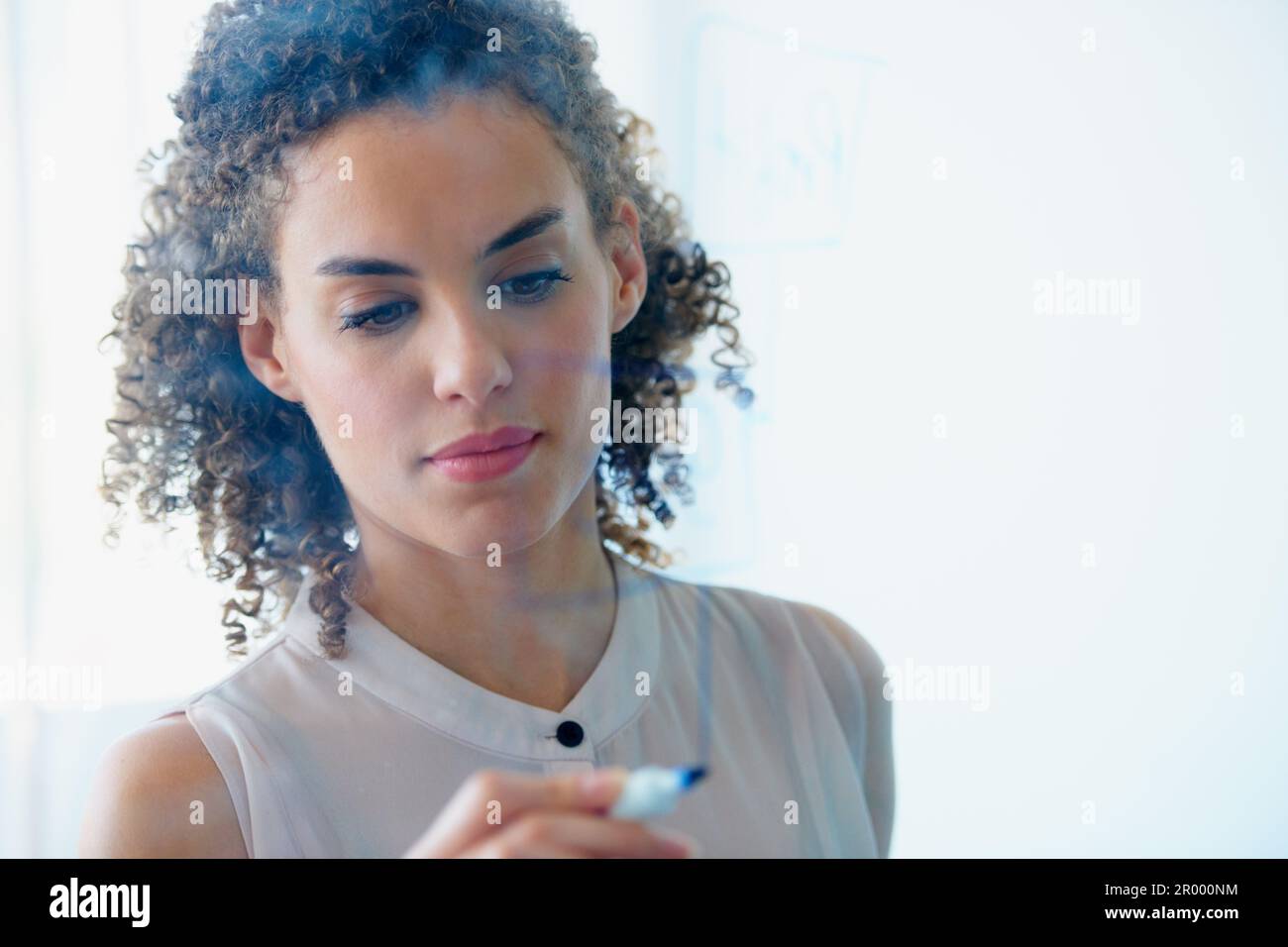 Serious, business woman and writing schedule for planning ...