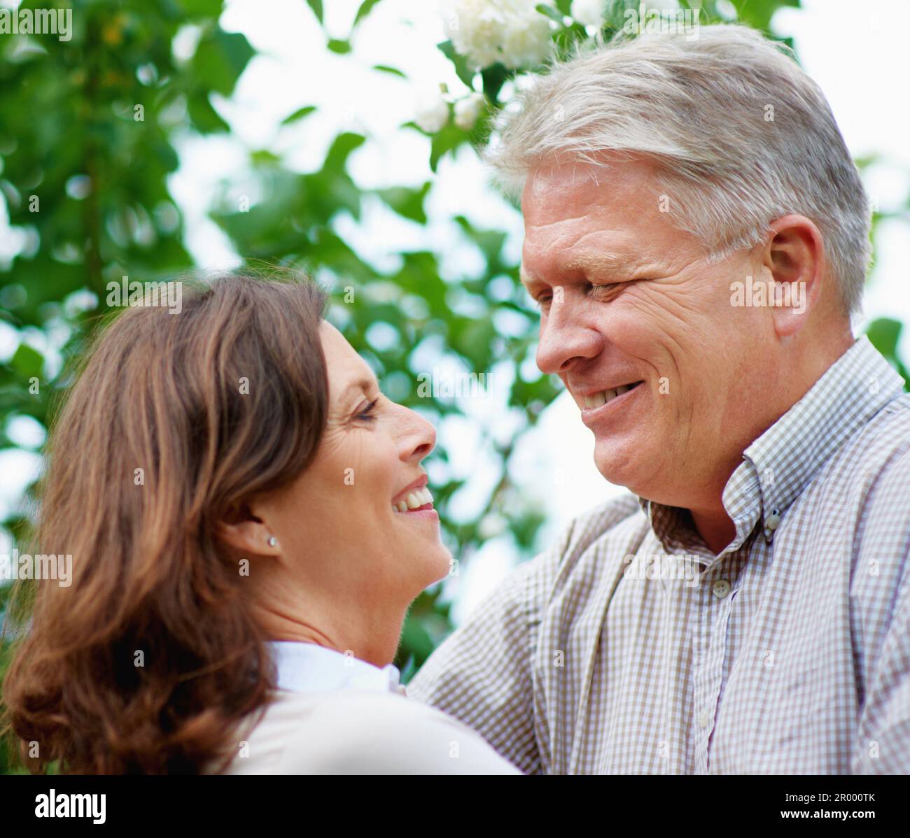 The joys of a happy marriage. an affectionate senior couple standing ...