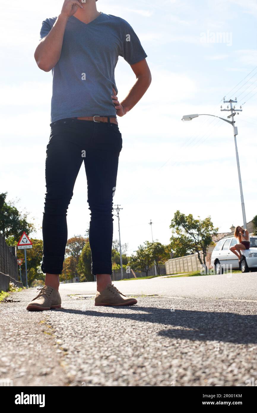Hipster styling. Cropped view of a young hipster guy standing in the ...