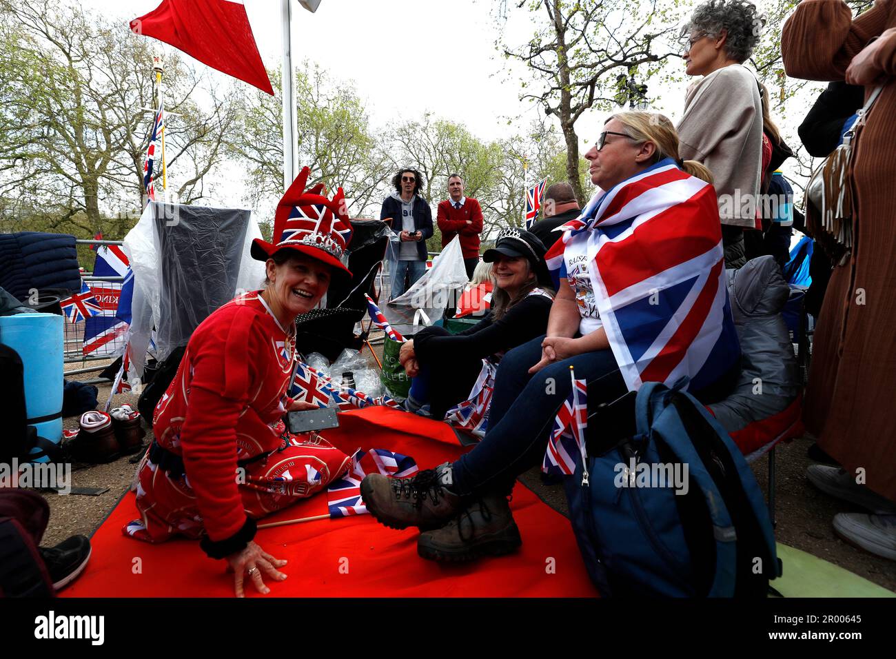 Visitors and loyalists line The Mall ahead of the Royal Coronation in ...