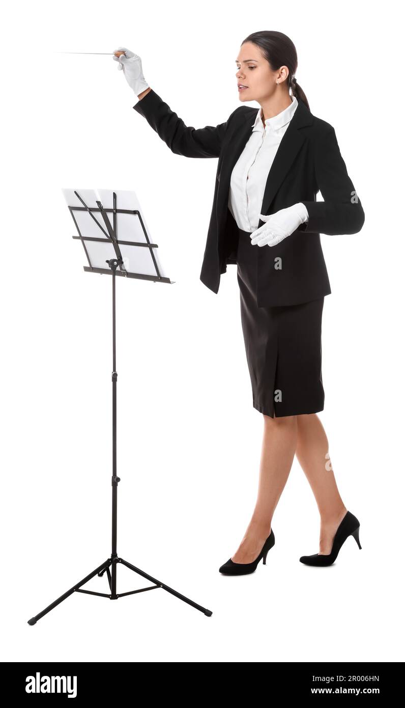 Professional conductor with baton and note stand on white background ...