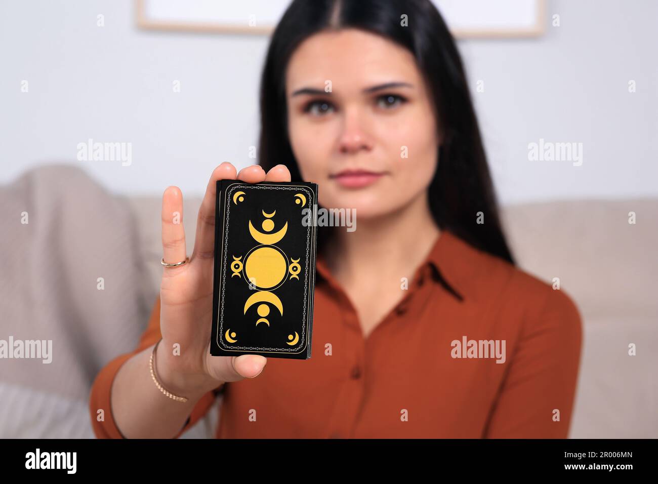 Soothsayer predicting future indoors. Focus on tarot cards Stock Photo ...