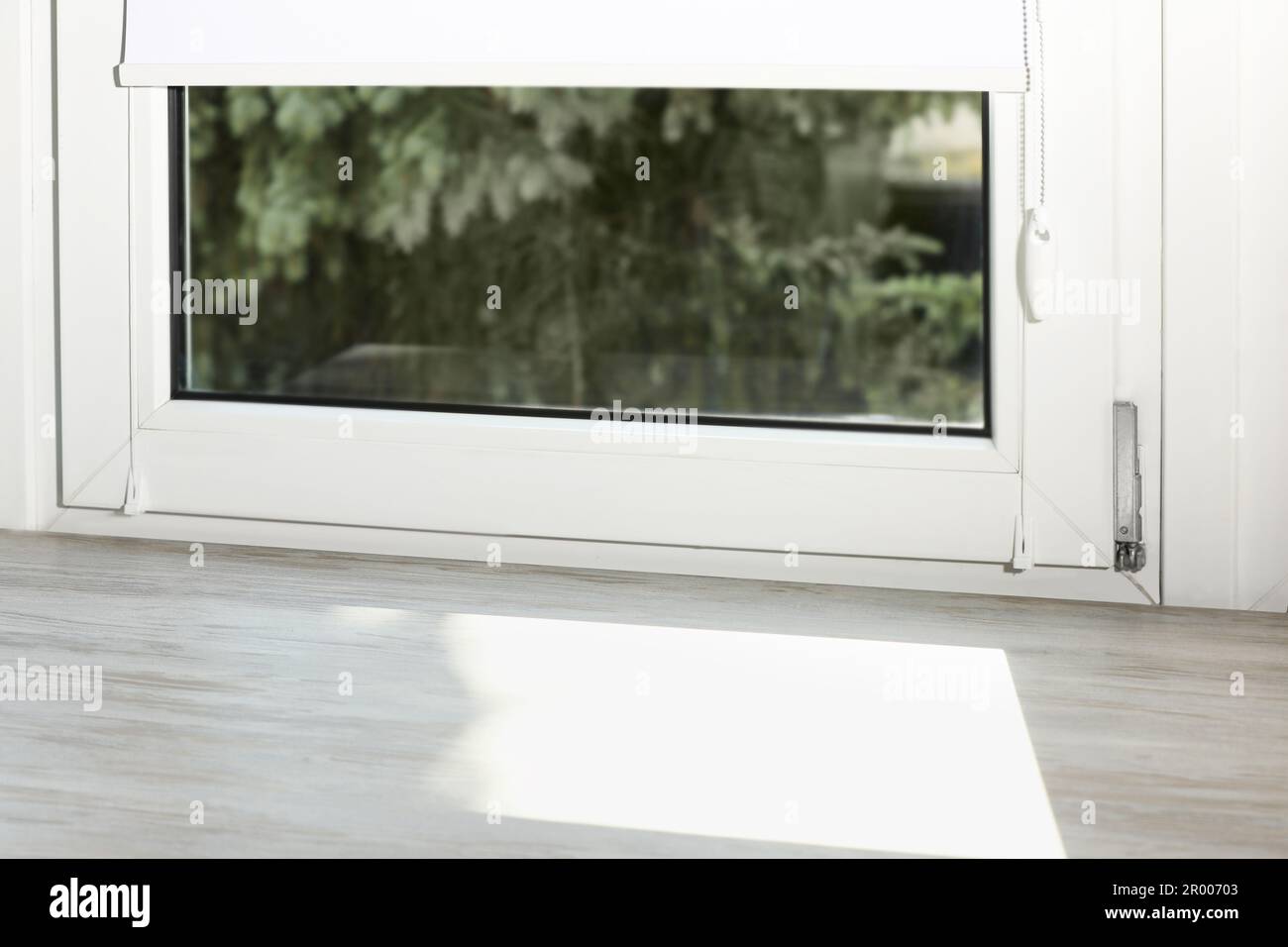 Empty wooden window sill and spruce tree outside Stock Photo - Alamy
