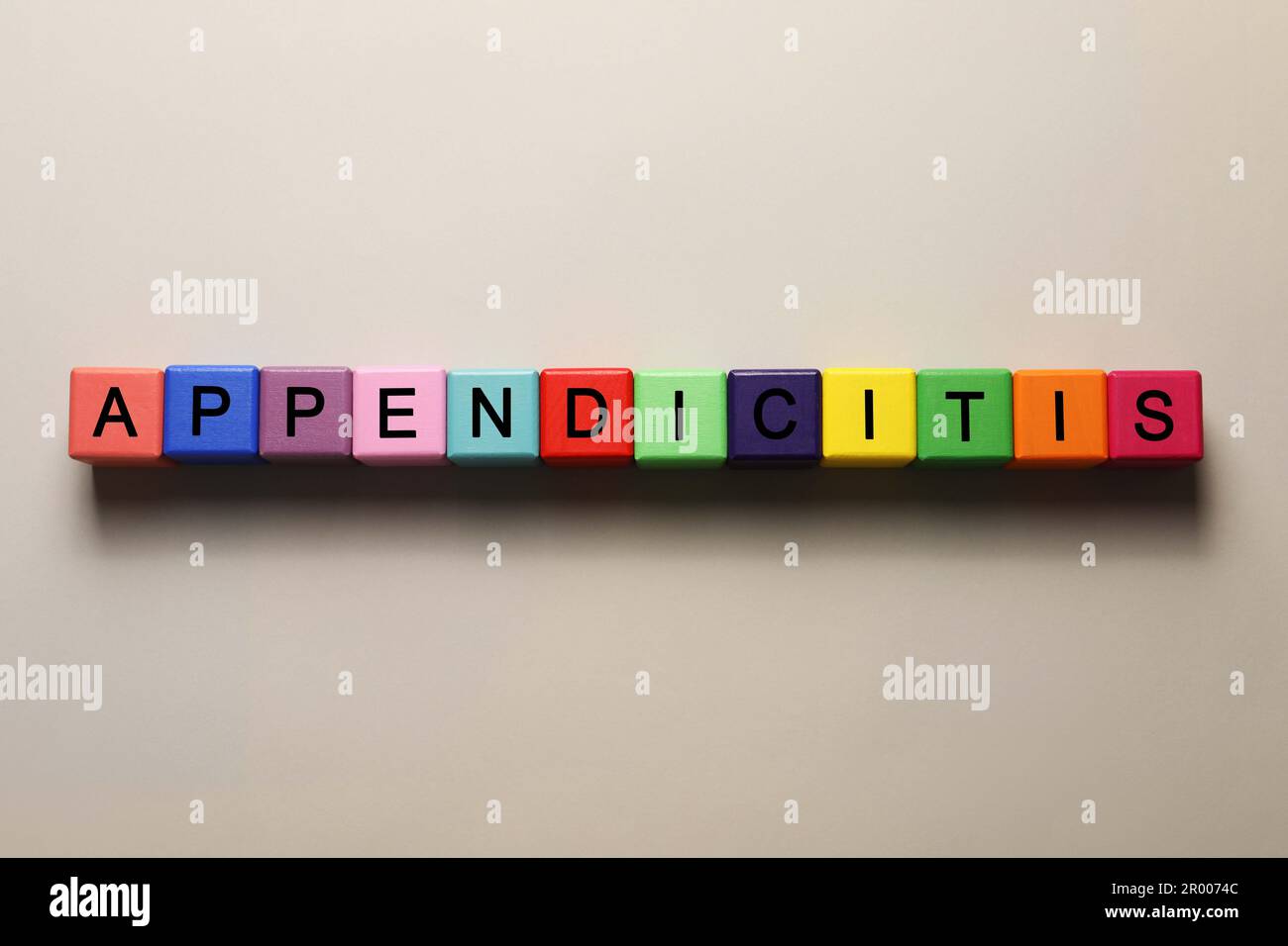 Word Appendicitis made of color cubes with letters on light background ...