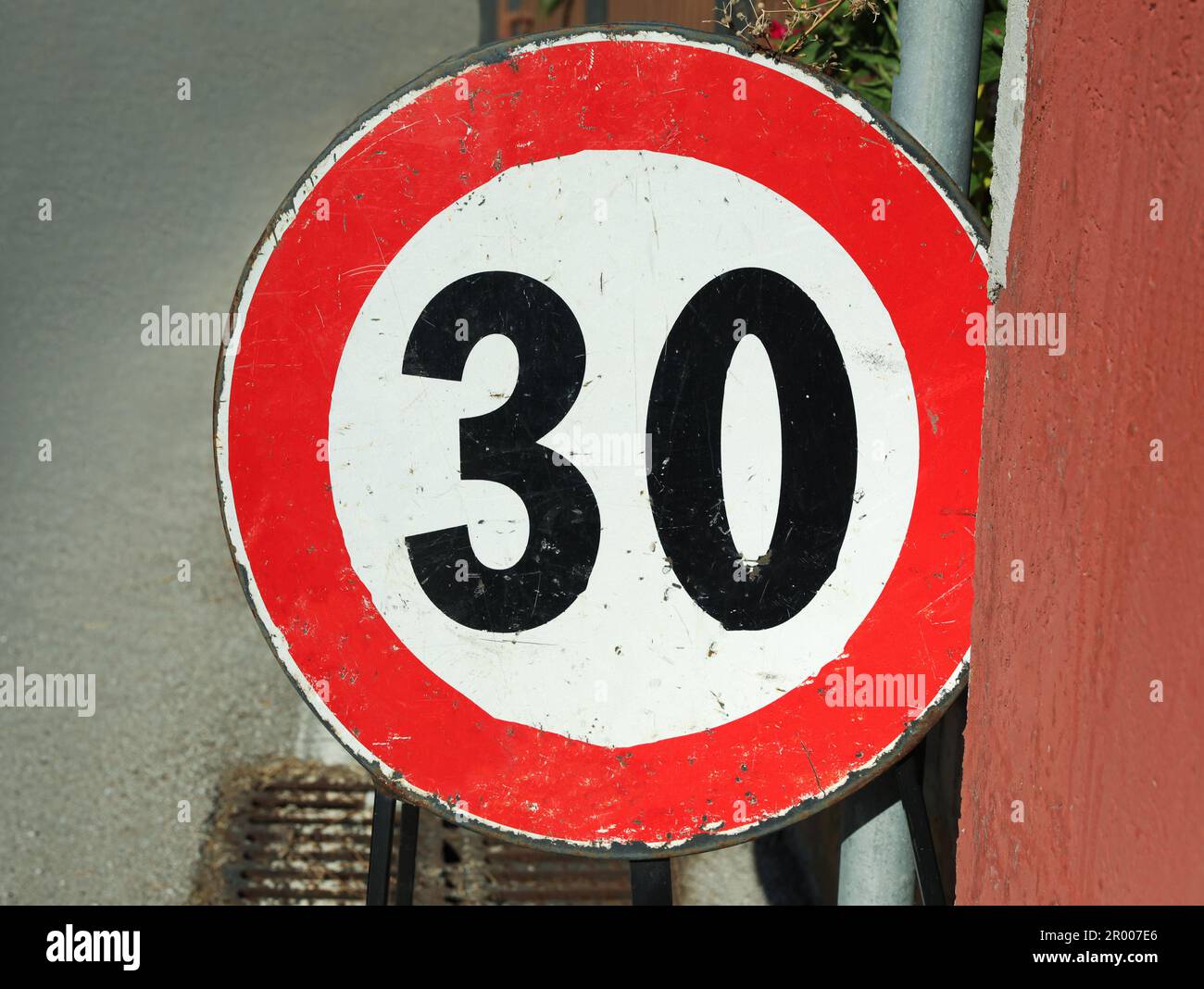 Road sign MAXIMUM SPEED 30 outdoors on sunny day Stock Photo - Alamy