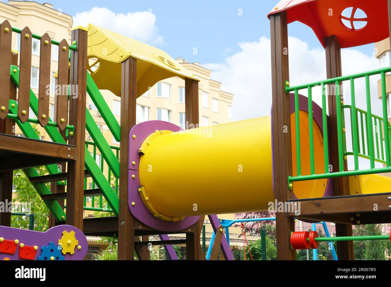Colourful outdoor playground for children in residential area Stock ...