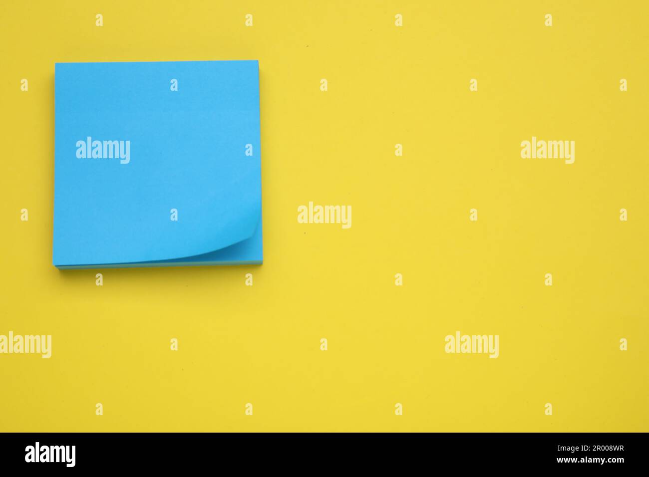 Paper note on yellow background, top view. Space for text Stock Photo ...