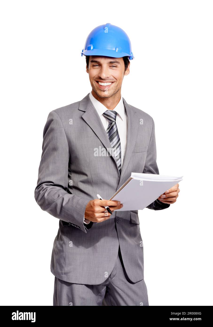 Confident contractor. A handsome young contractor wearing and holding ...