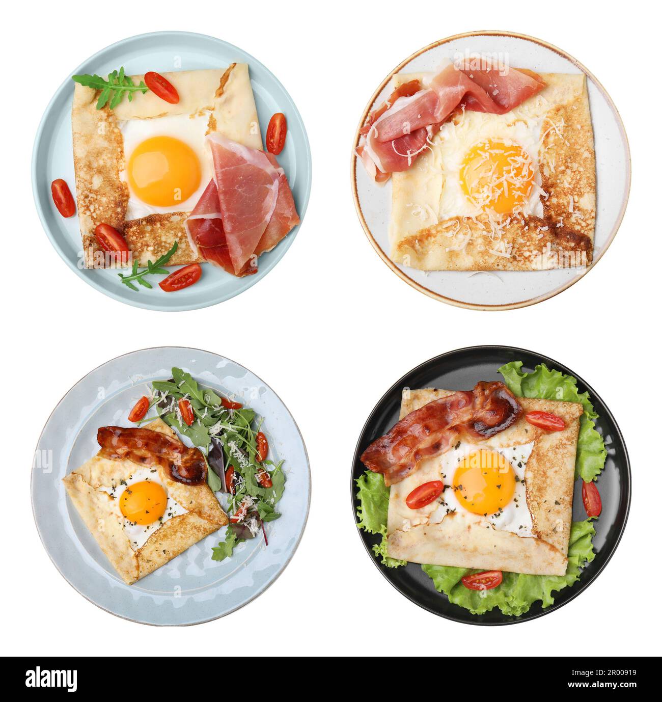 Set with delicious crepes with eggs on white background, top view ...