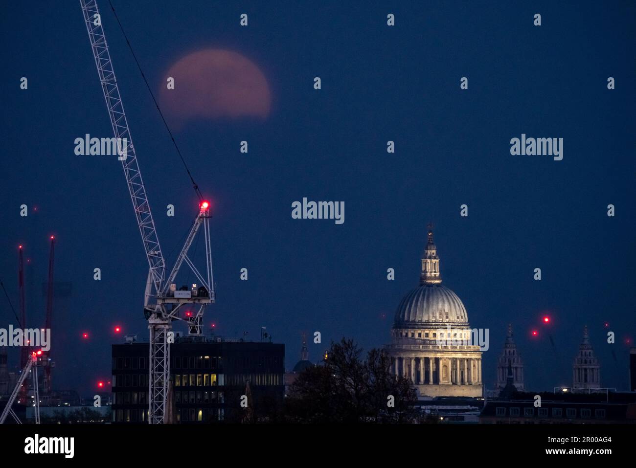 London, UK. 5th May 2023. UK Weather: Flower Moon rises over St Paul’s ...
