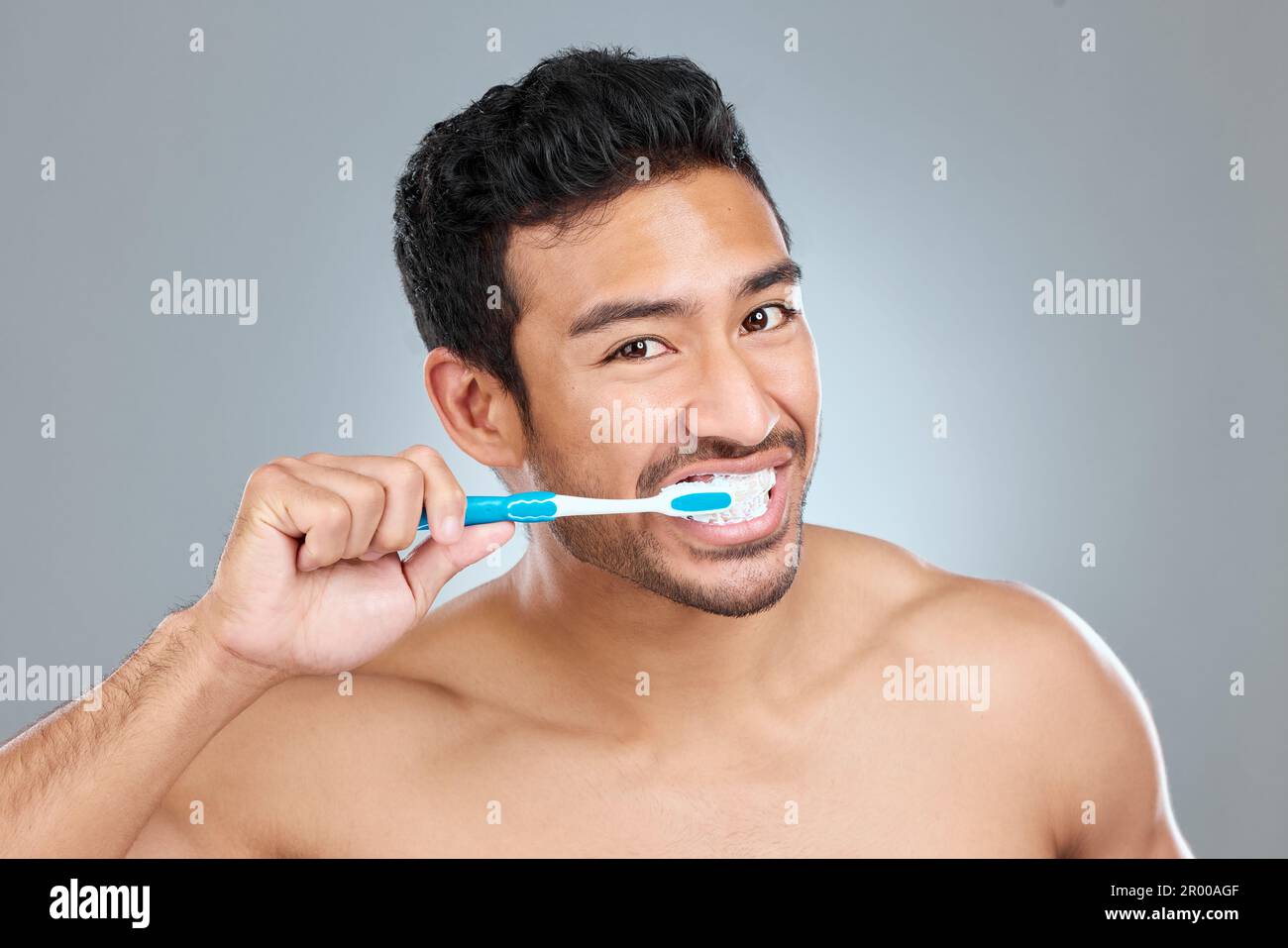 Theres a right way to brush and floss your teeth. a man brushing his ...