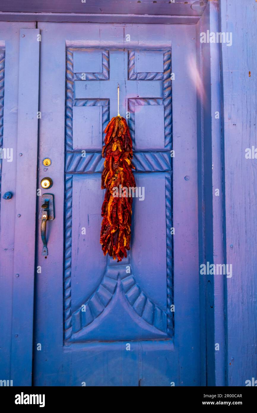 Chili Ristra Hangs from a Purple Door in Santa Fe, New Mexico Stock ...