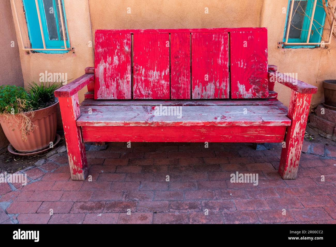 Rustic Red Bench is Part of the Santa Fe Chic Decor in New Mexico Stock ...