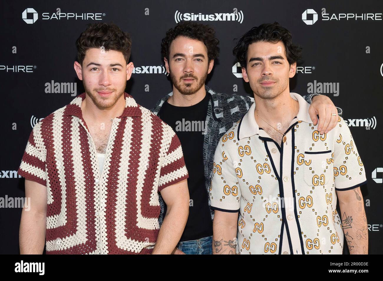 Nick Jonas, from left, Joe Jonas, and Kevin Jonas of the Jonas Brothers perform at the new ...
