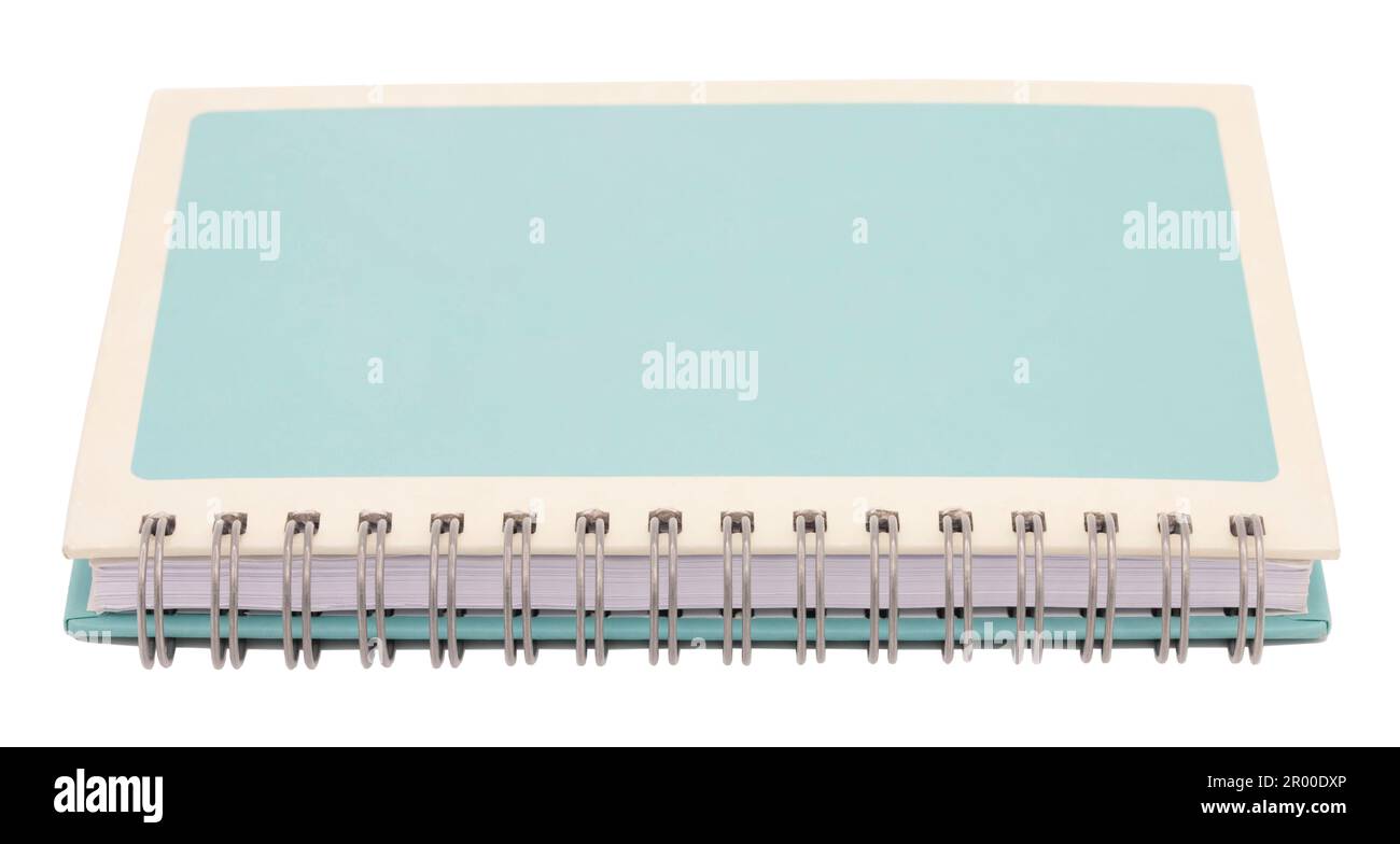 Light blue spiral notebook with white frame on cover page isolated on ...