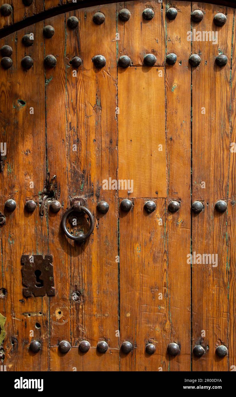 Antique moroccan style wooden door hi-res stock photography and images ...