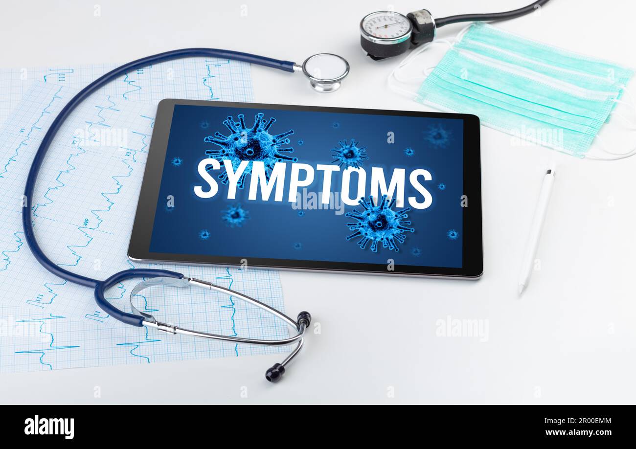 Tablet pc and doctor tools on white surface Stock Photo - Alamy