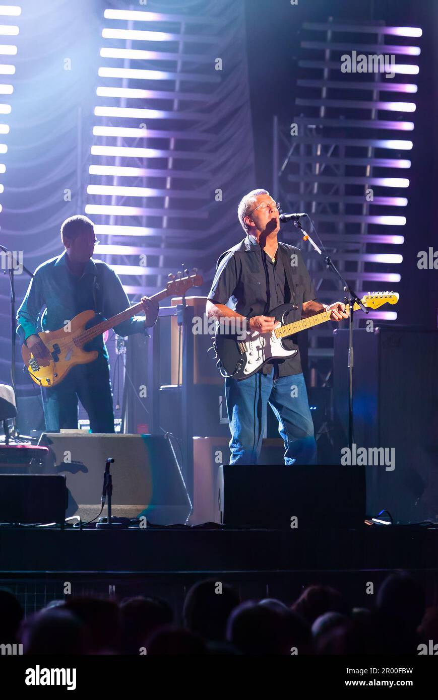 Eric Clapton and his band performing live in concert in Sydney ...