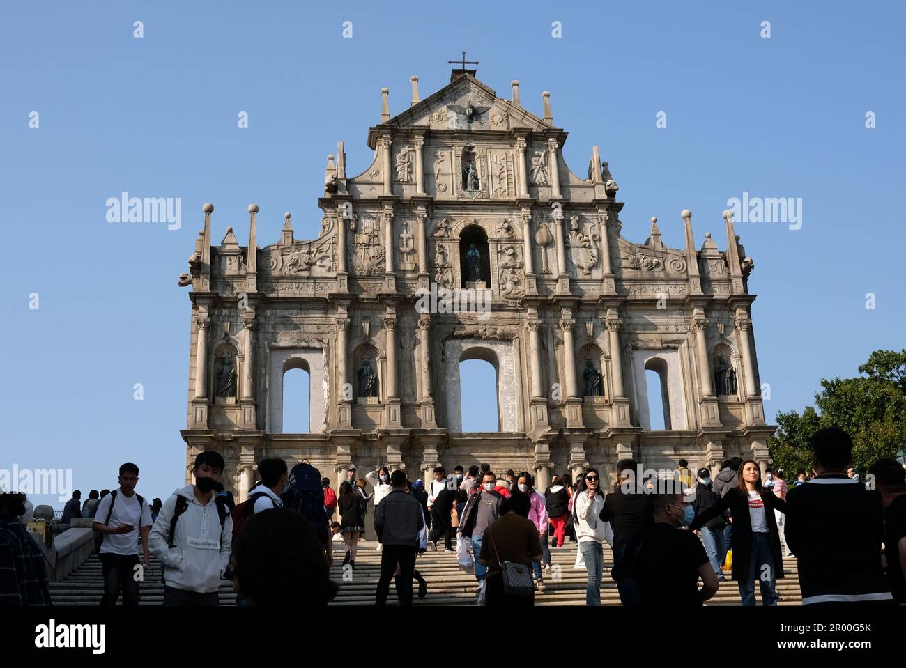 Tourists on the steps of the ruins of St Paul taking photos and selfies ...